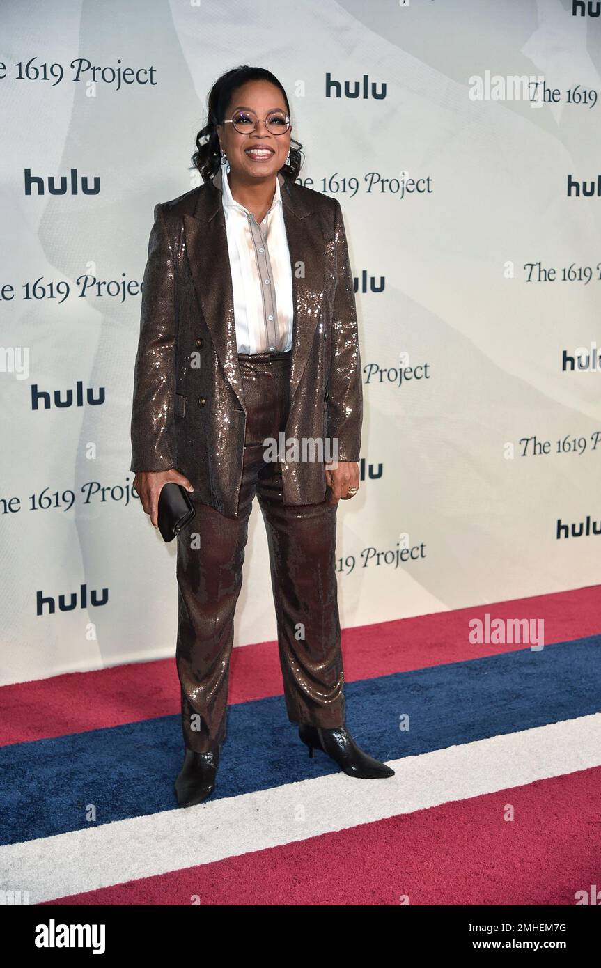Oprah Winfrey arrives at the premiere of "The 1619 Project" on Thursday ...