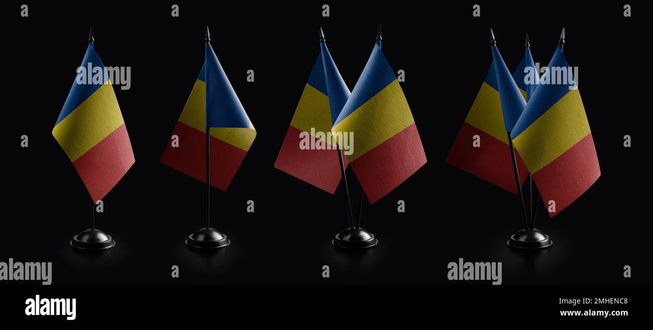 Small national flags of the Romania on a black background Stock Photo ...