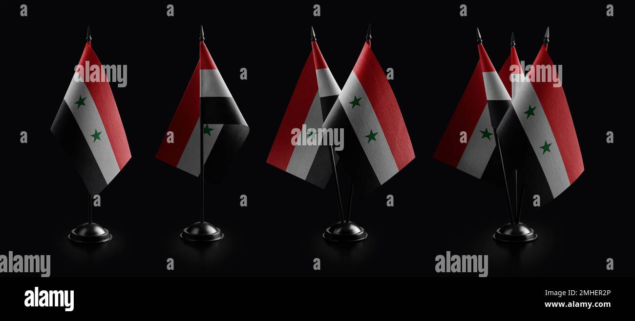Small national flags of the Syria on a black background Stock Photo - Alamy