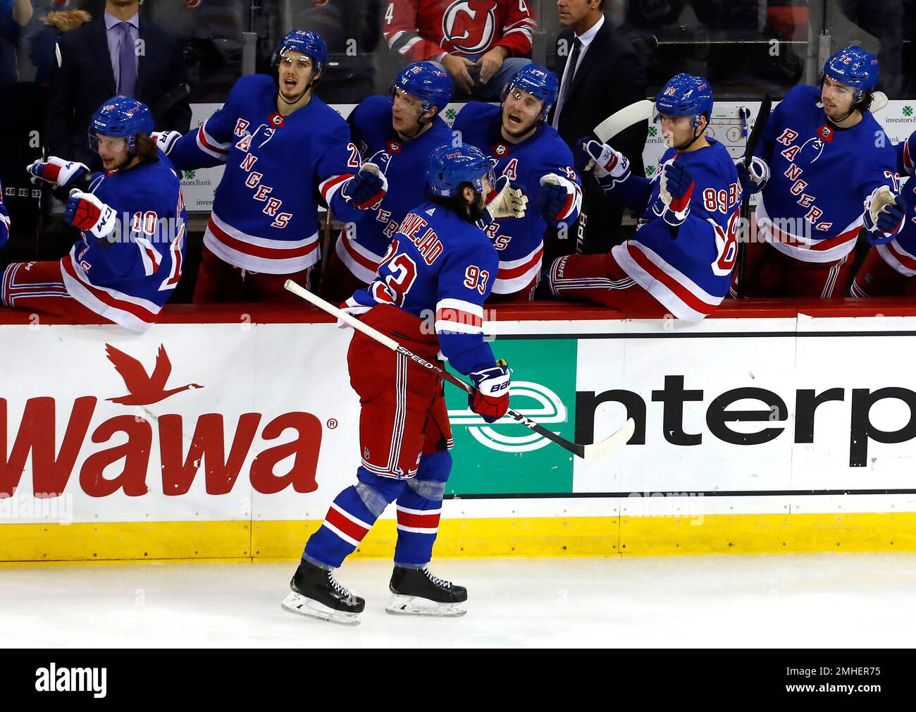 New York Rangers center Mika Zibanejad (93) celebrates with teammates ...