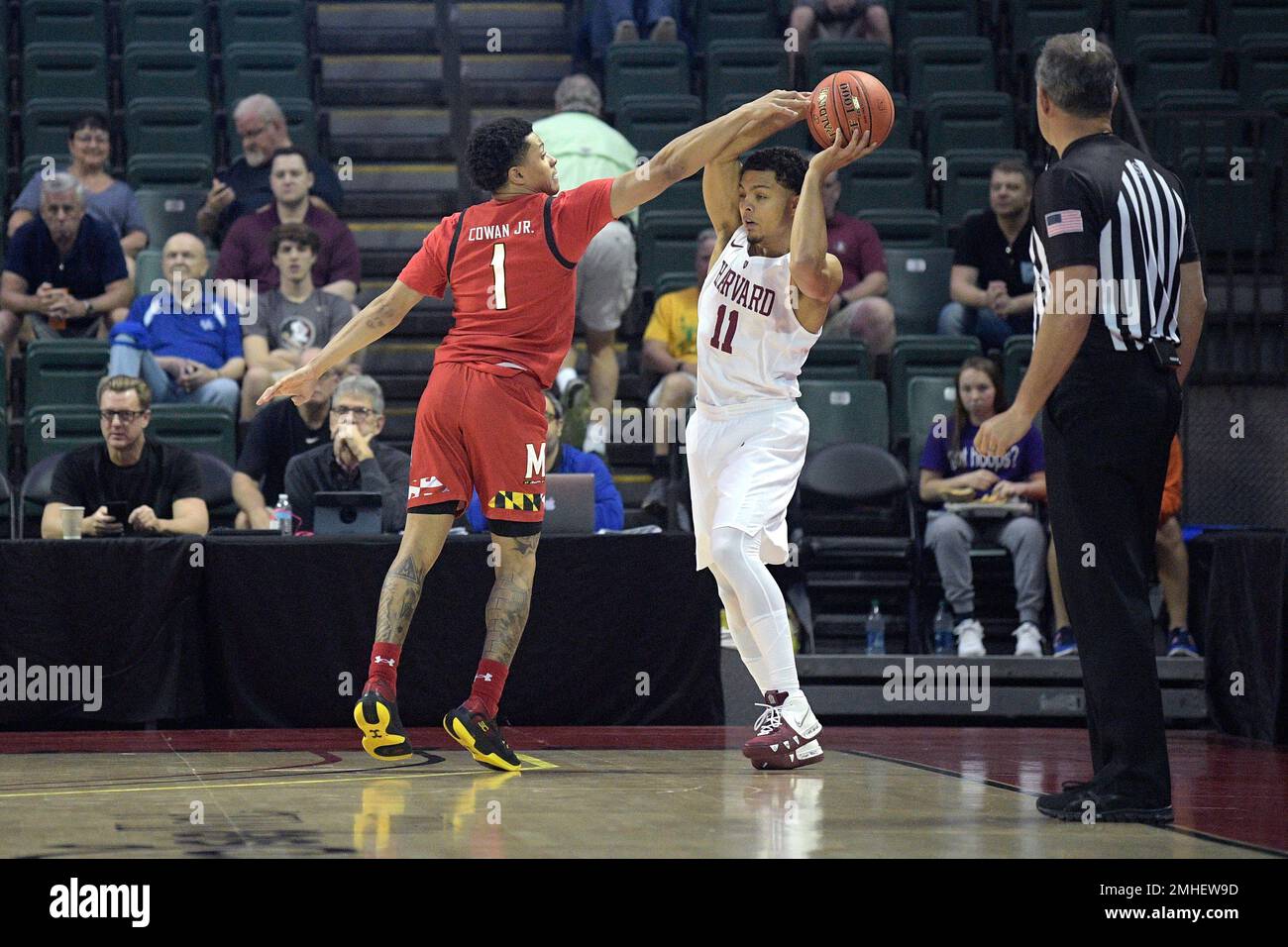 Maryland guard Anthony Cowan Jr. (1) defends against Harvard guard ...