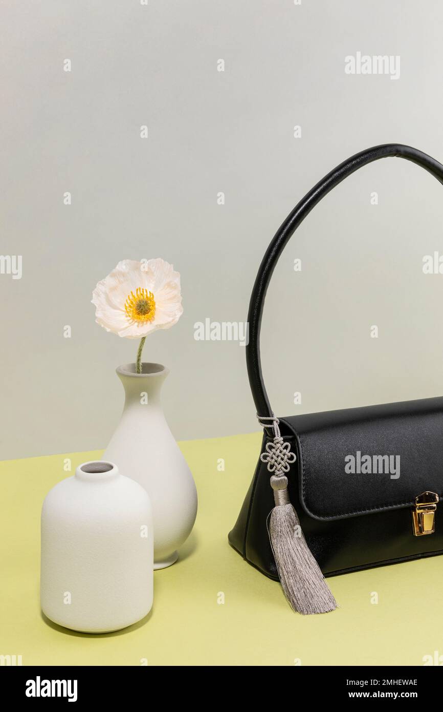 collection of korean traditional objects a bag decorated with pottery ...