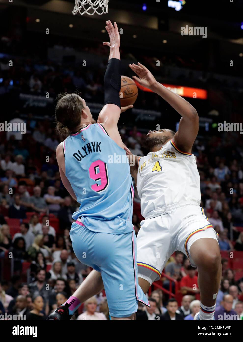 Golden State Warriors forward Omari Spellman (4) is fouled by Miami ...