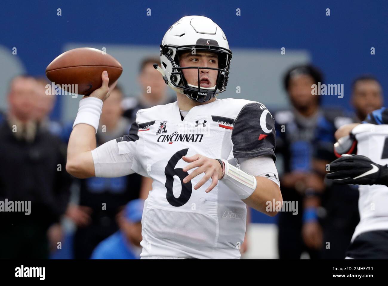Cincinnati quarterback Ben Bryant passes against Memphis in the first ...