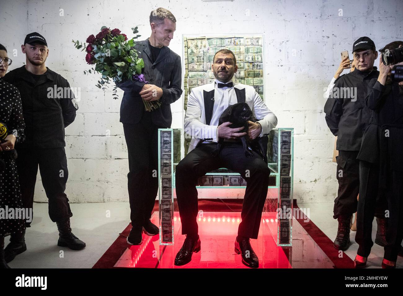 Russian millionaire Igor Rybakov, center, and artist Alexei Sergienko ...