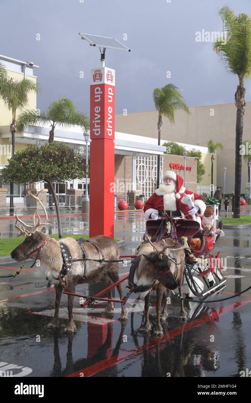 IMAGE DISTRIBUTED FOR TARGET - Santa, Bullseye and reindeers pull up ...