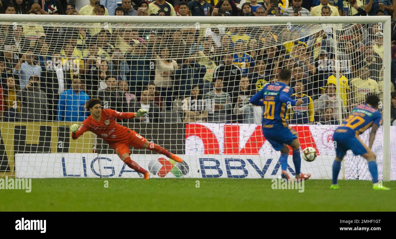 Tigres' Andre-Pierre Gignac scores a penalty shoot agains America's ...