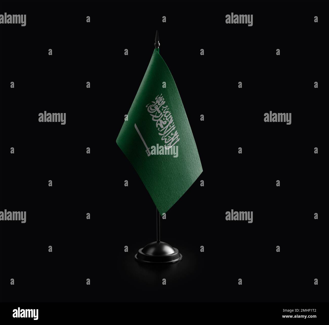 Small national flag of the Saudi Arabia on a black background Stock ...