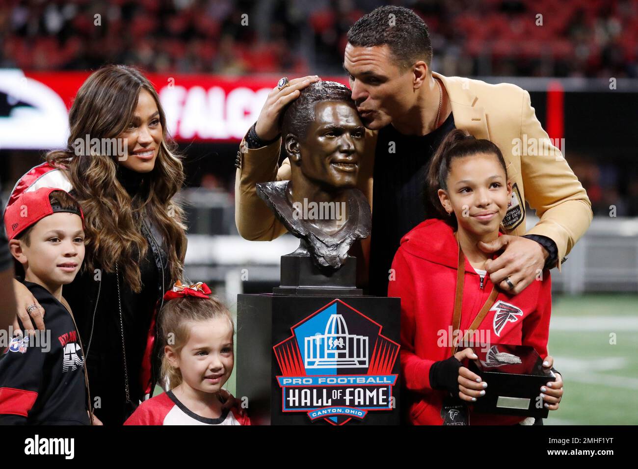 Former NFL player and Football Hall of Fame member Tony Gonzalez stands ...