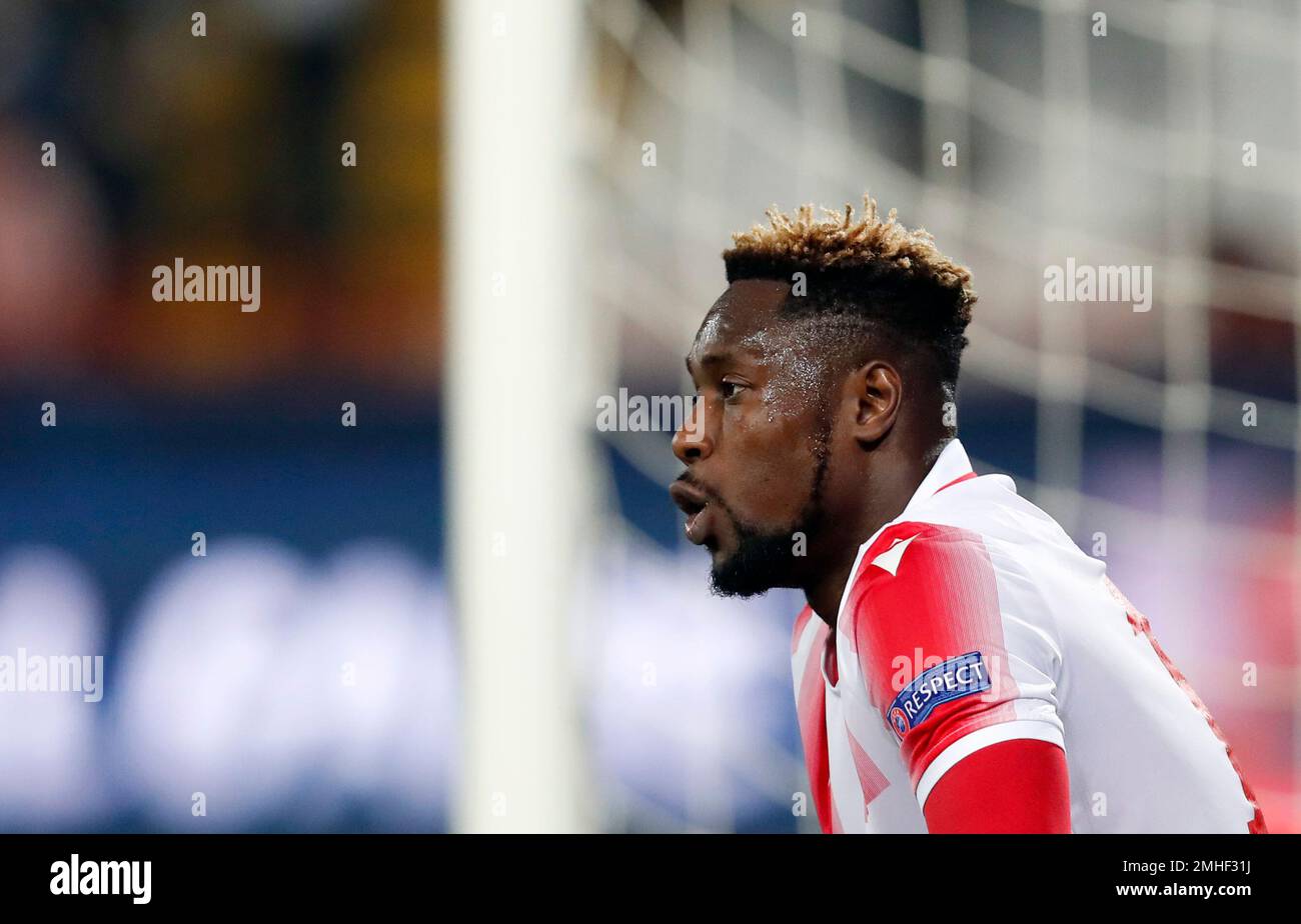 Red Star's Richmond Boakye sits on the pitch after the Champions League ...