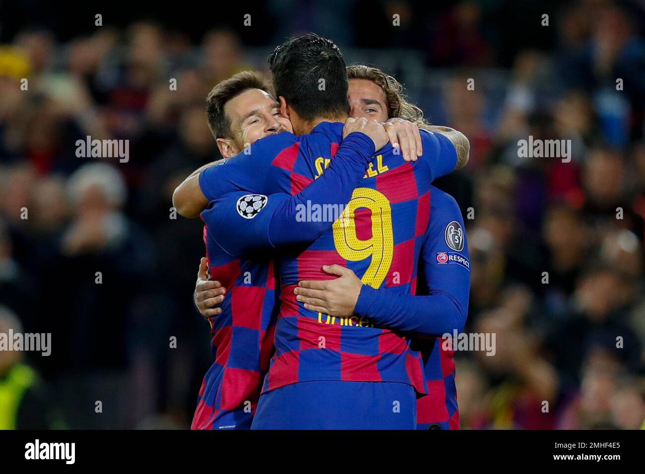 Barcelona's Lionel Messi, left, celebrates after scoring his side's ...