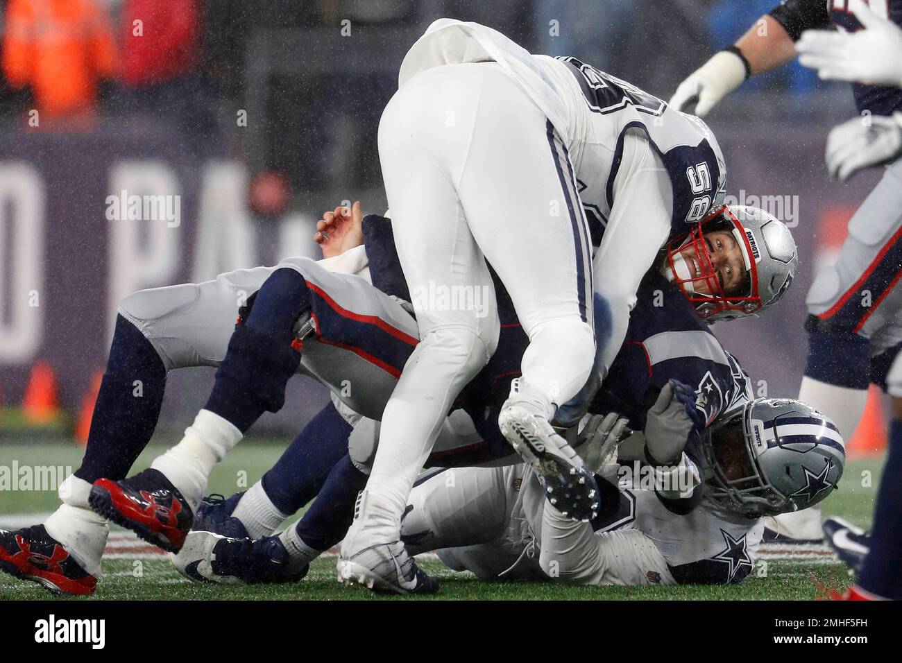 New England Patriots quarterback Tom Brady is sacked during an NFL ...