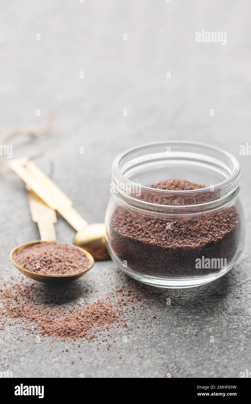 Jar of India black kala namak salt. Healthy food concept. Speciality ...