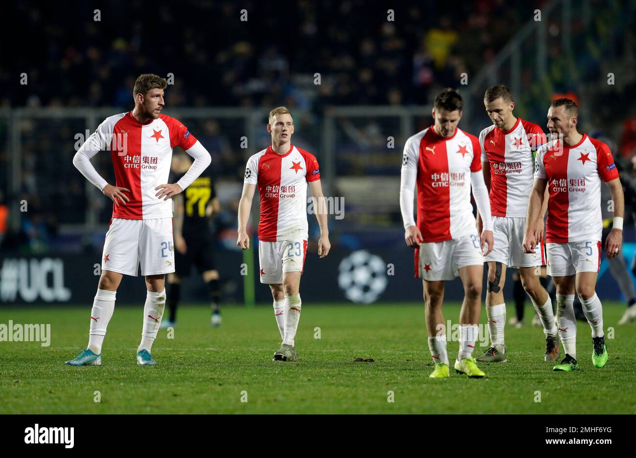 Slavia players leave the field at the end of the Champions League group ...