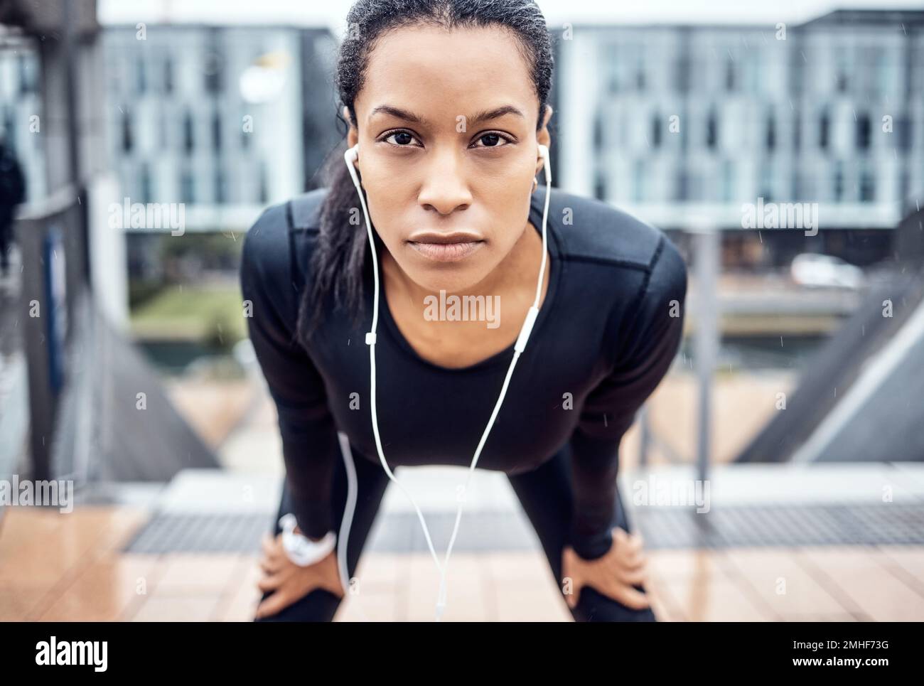 Portrait, tired and serious with a sports black woman taking a rest ...