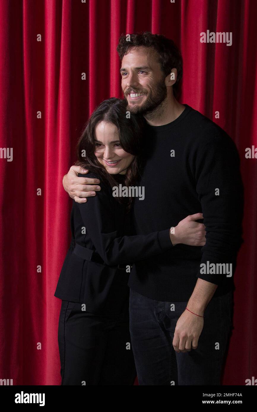 Actors Sam Claflin, right, and Aisling Franciosi pose for photographers ...