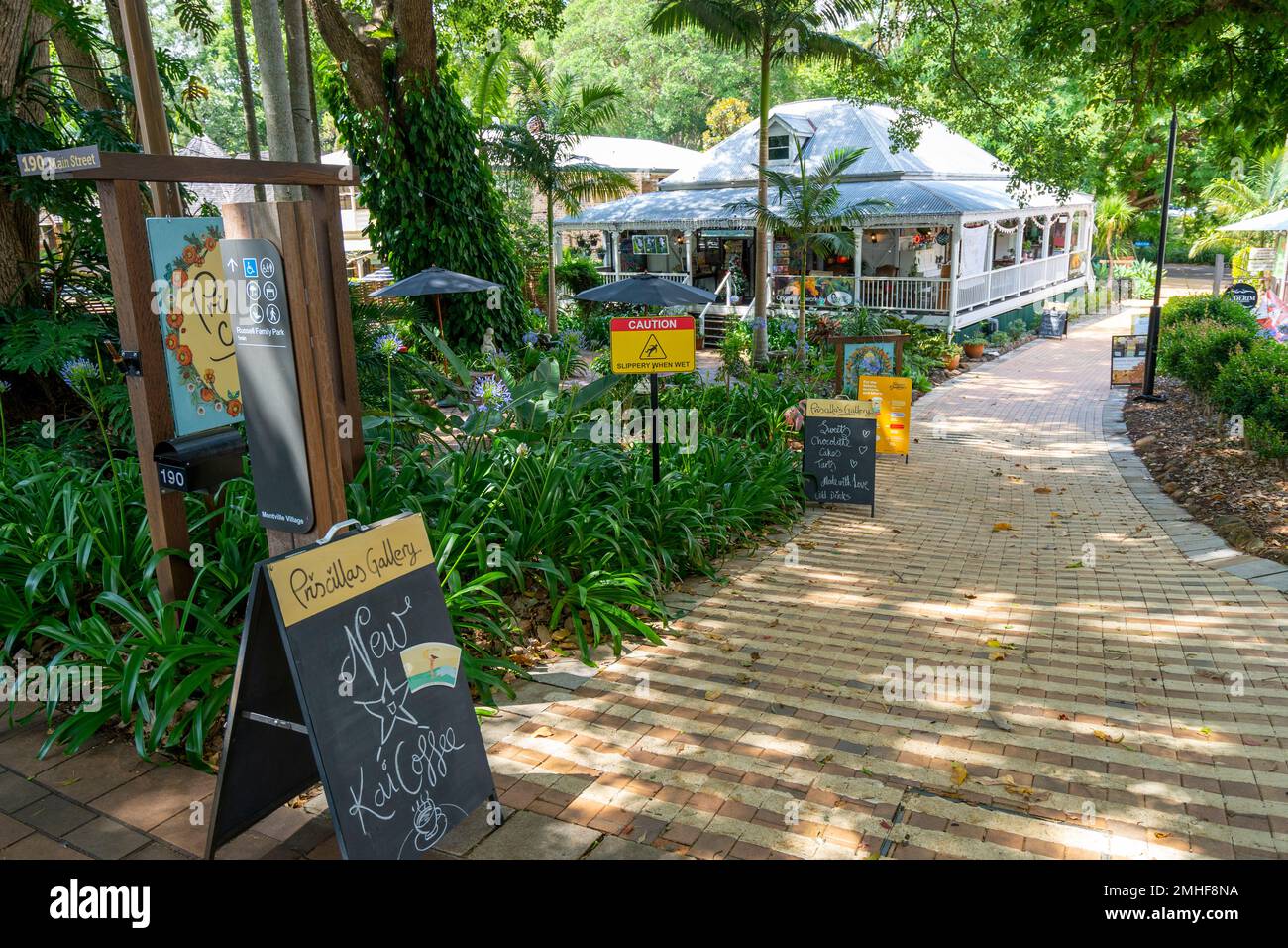 Cafe surrounded by trees in main street of Maleny, Sunshine Coast ...