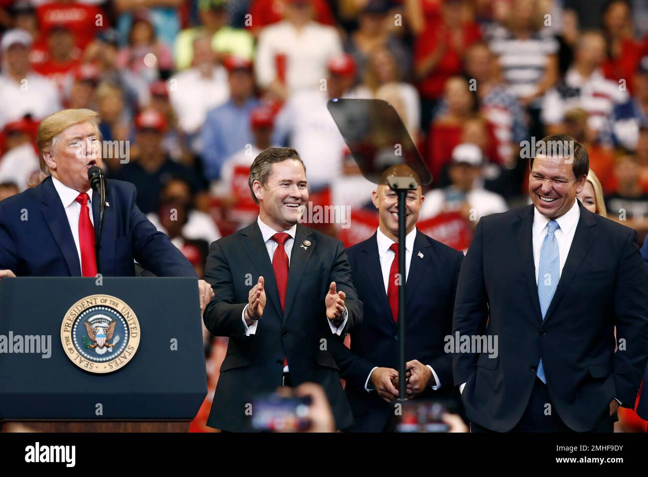 President Donald Trump makes Florida Gov. Ron DeSantis laugh as he ...