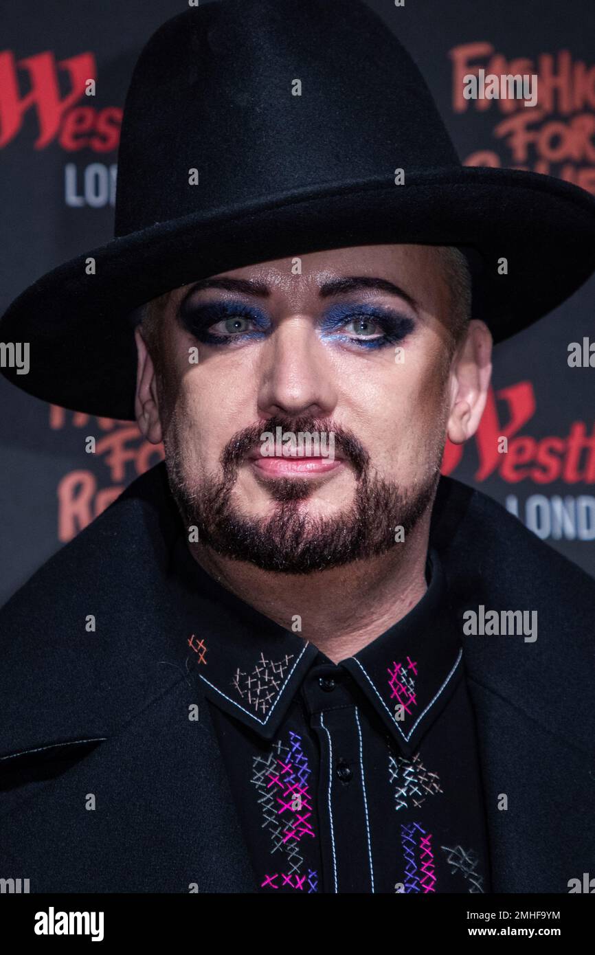 Singer Boy George poses for photographers upon arrival at the opening ...