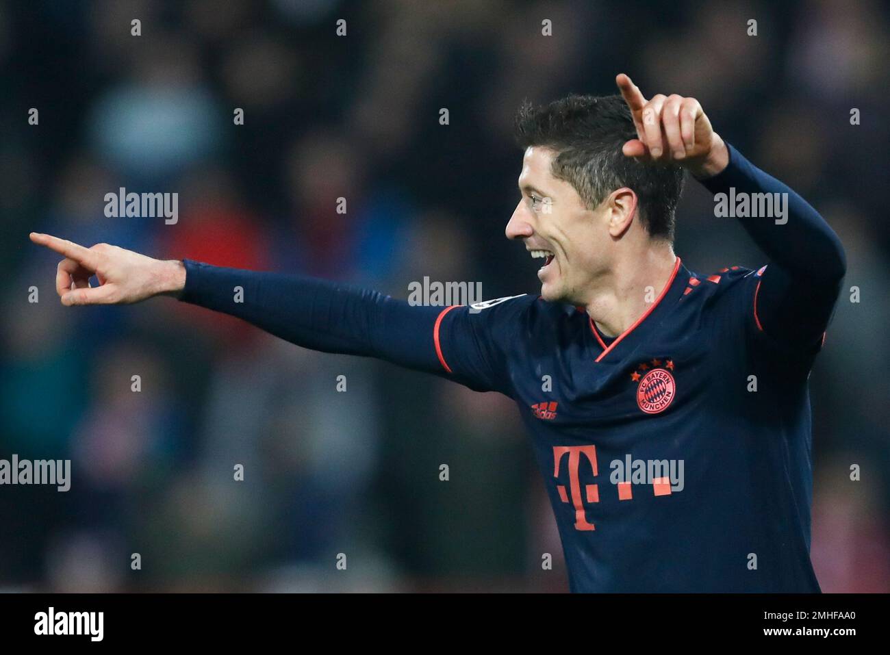 Bayern's Robert Lewandowski celebrates after scoring his side's third ...