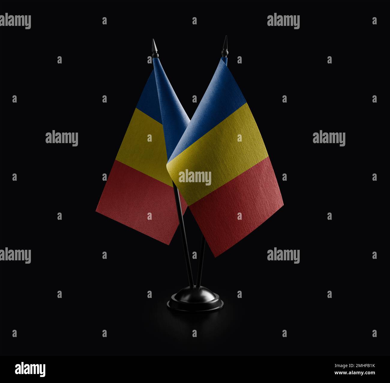 Small national flags of the Romania on a black background Stock Photo ...
