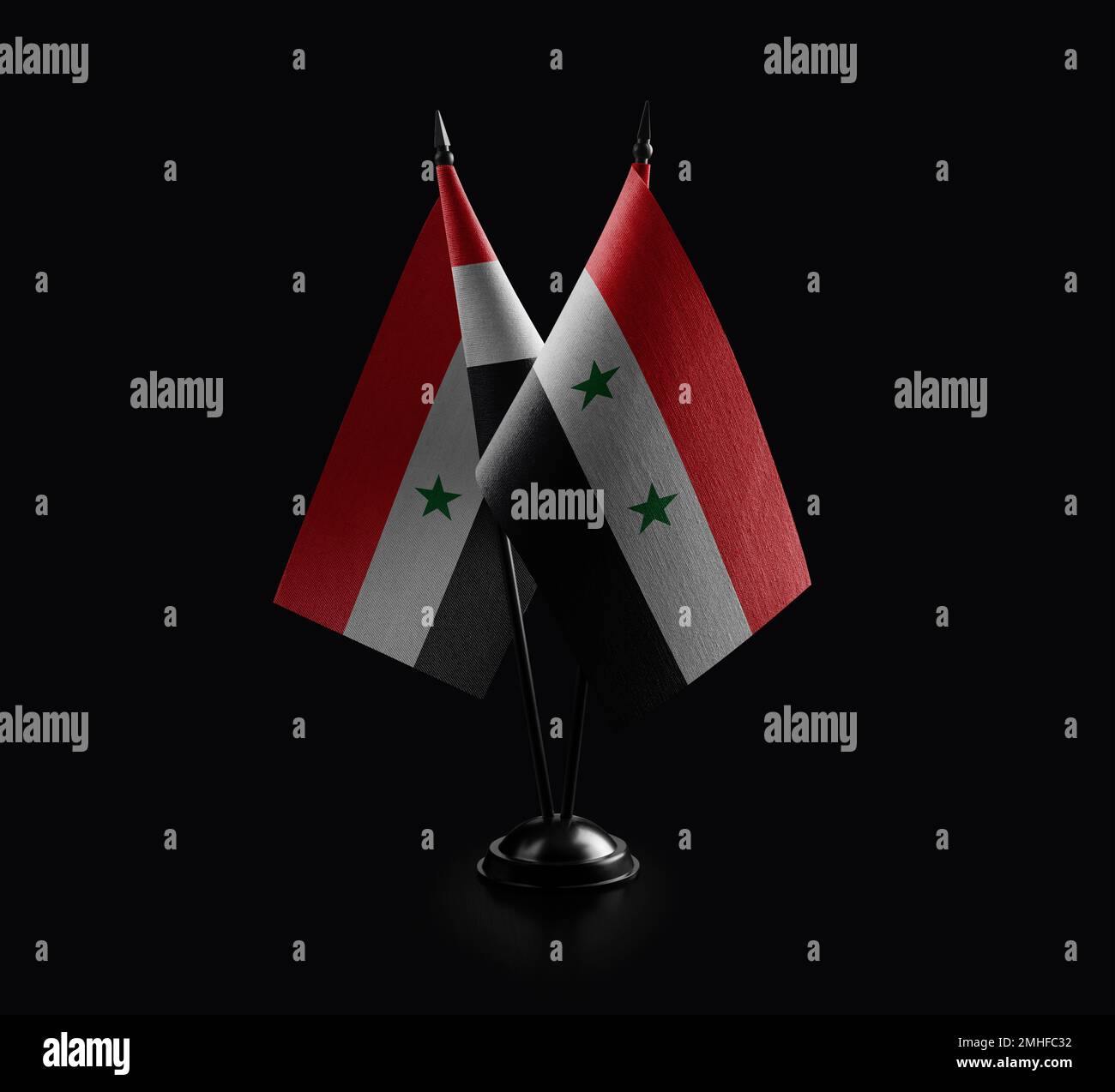 Small national flags of the Syria on a black background Stock Photo - Alamy