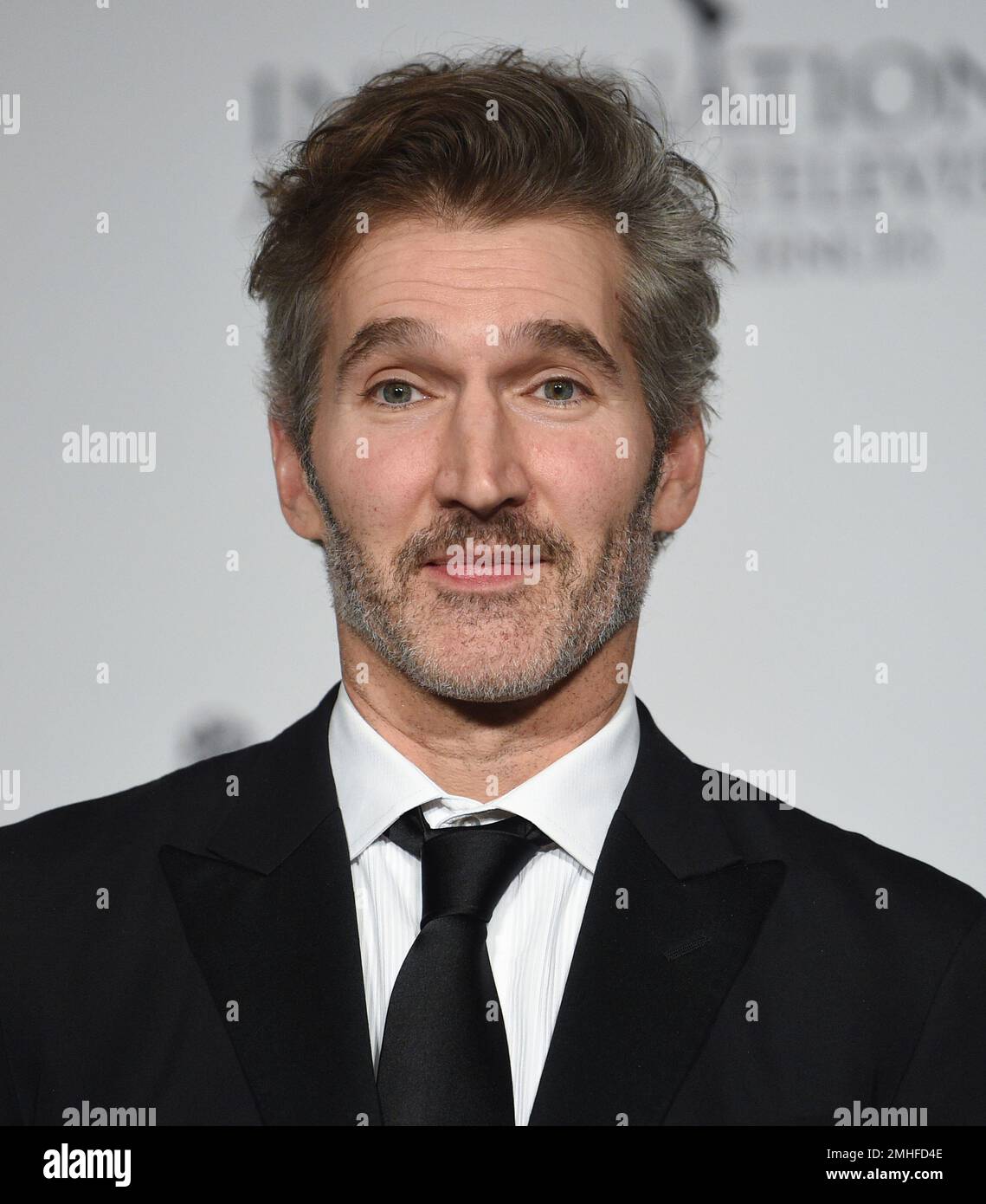 The founders award recipient David Benioff poses in the press room ...
