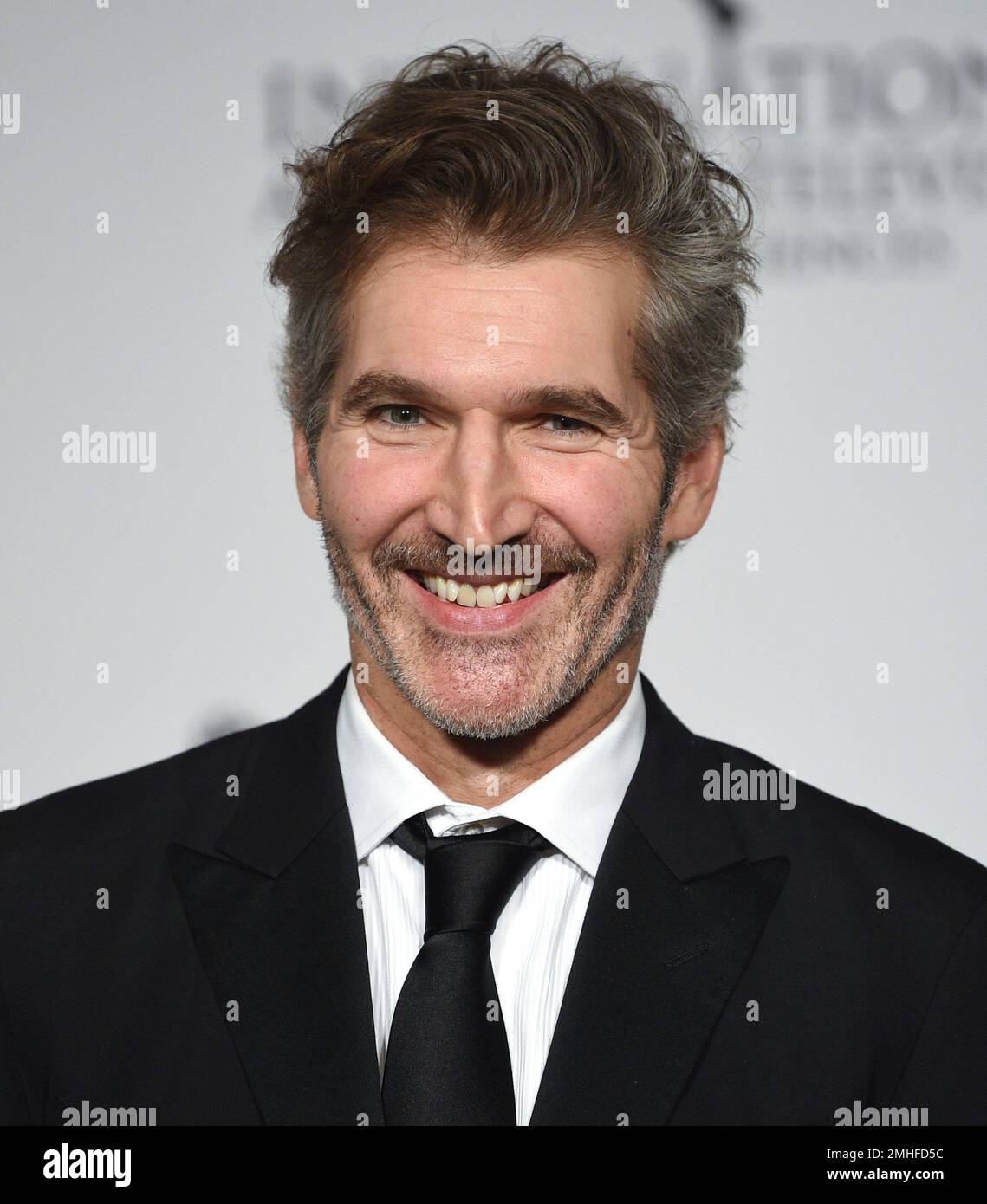 The founders award recipient David Benioff poses in the press room ...
