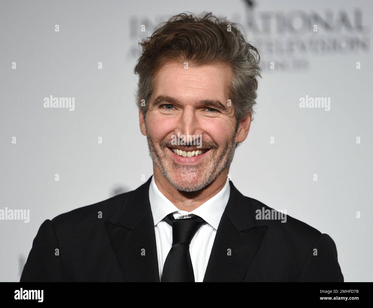 The founders award recipient David Benioff poses in the press room ...