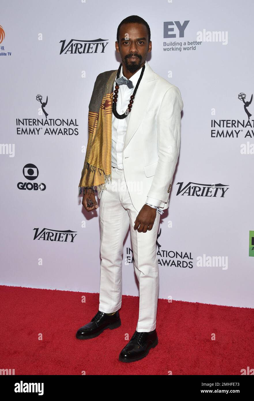 Raphael Logam arrives at the 47th International Emmy Awards gala at the ...