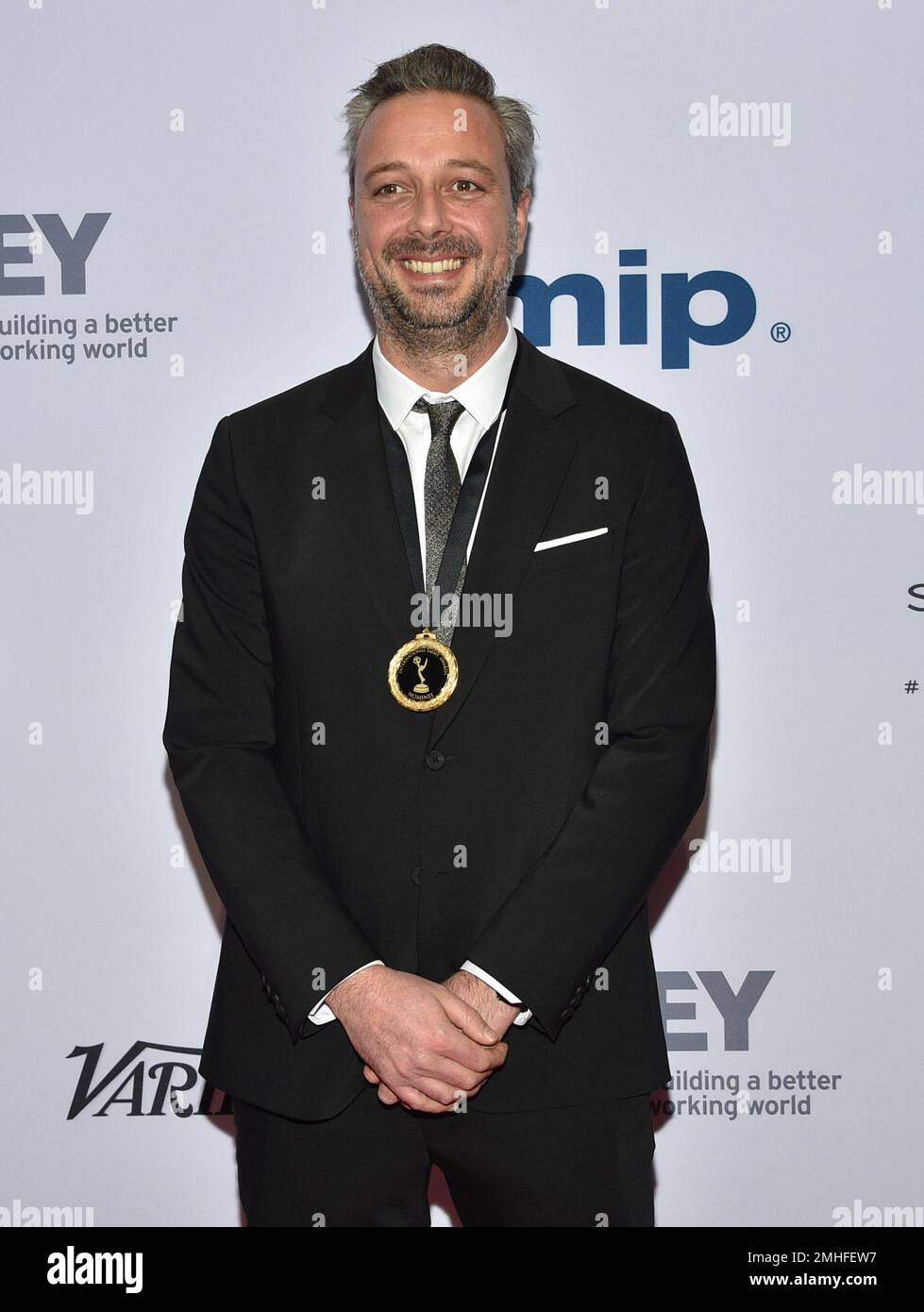 Tom Baetens arrives at the 47th International Emmy Awards gala at the ...