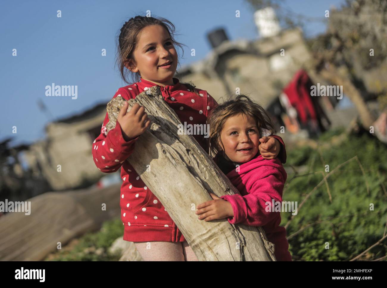 Gaza, Palestine. 25th Jan, 2023. Palestinian girls play in front of ...