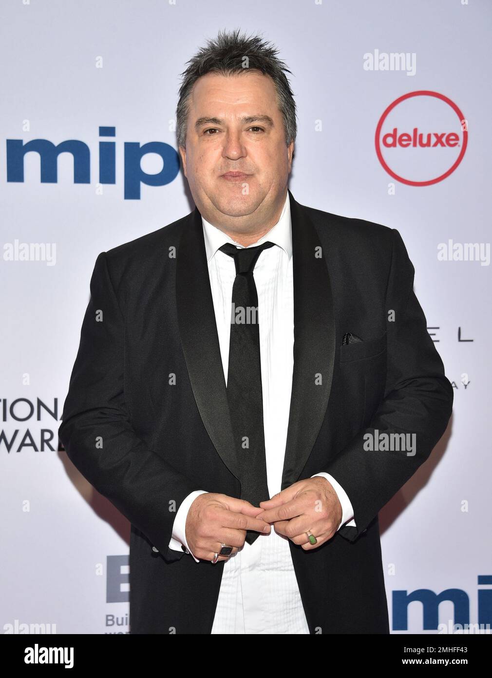 Stephen Corvini arrives at the 47th International Emmy Awards gala at ...
