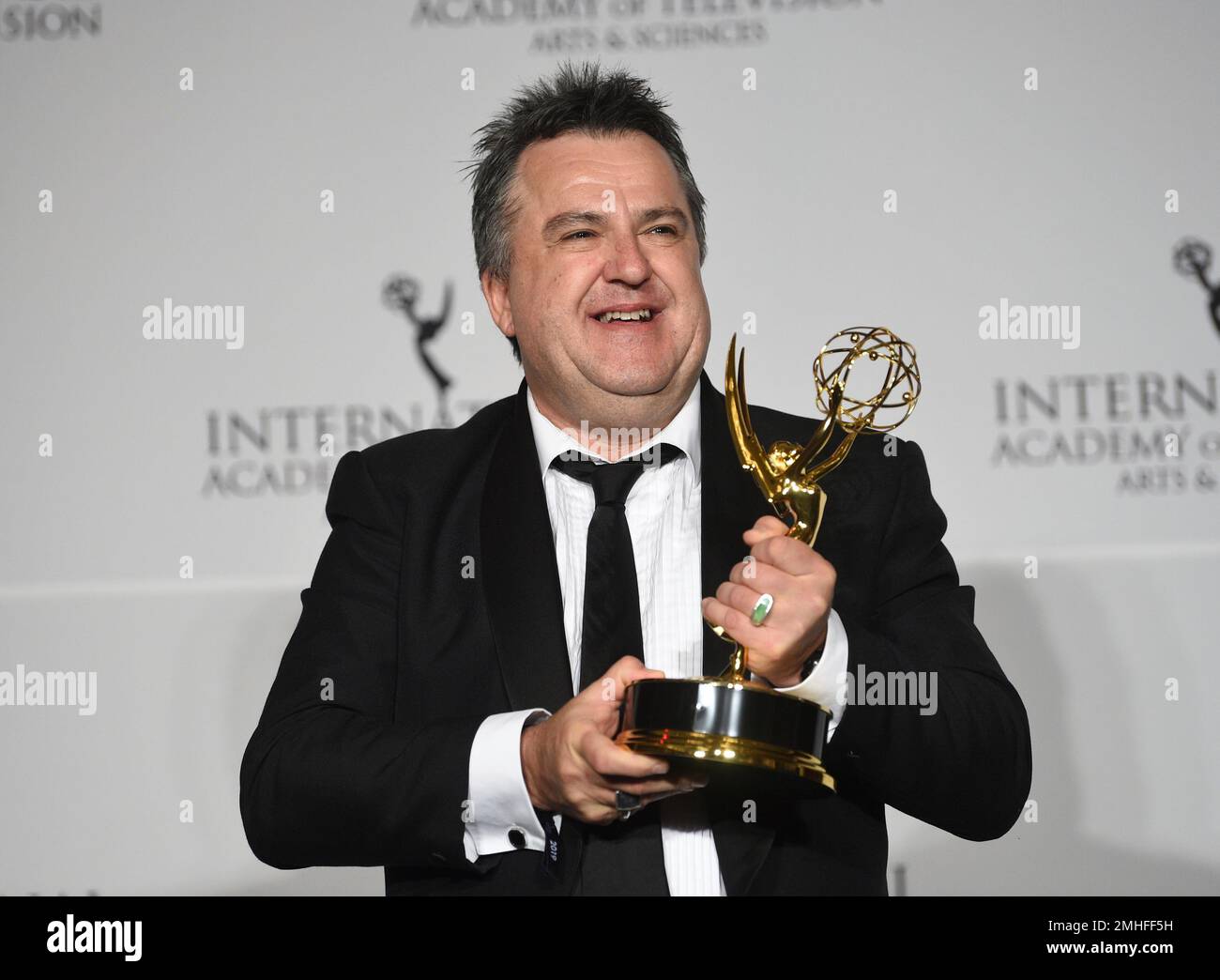 Australian producer Stephen Corvini poses with the tv movie ...