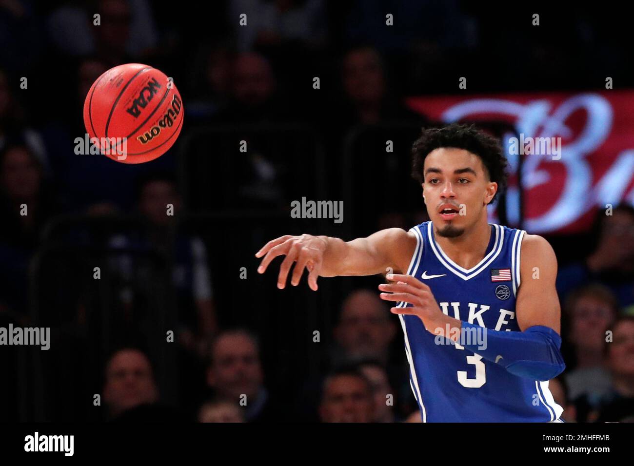Duke guard Tre Jones (3) passes during the second half of an NCAA ...