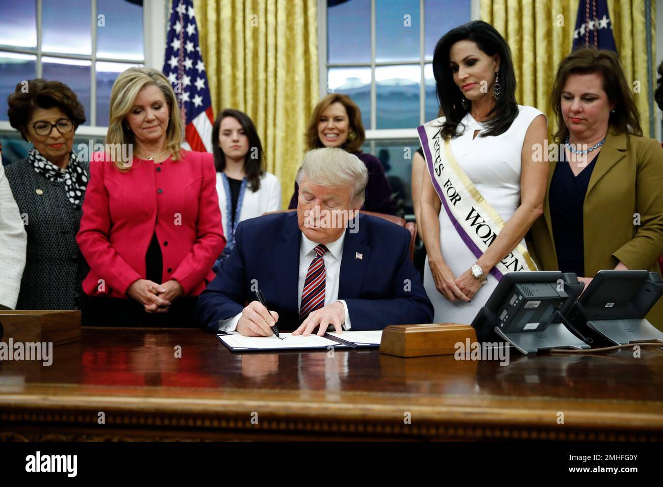 President Donald Trump signs the Women's Suffrage Centennial ...