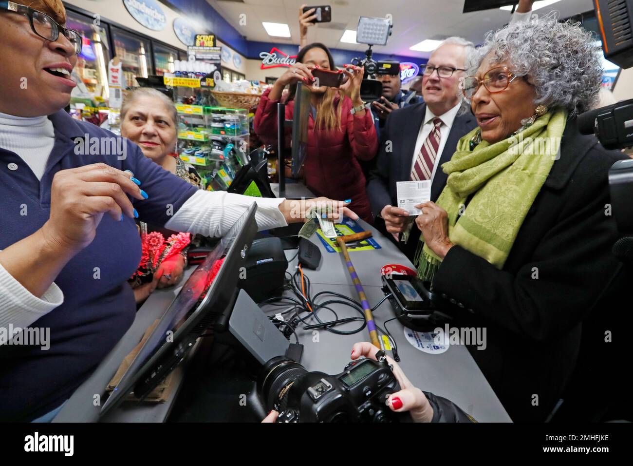 Rep. Alyce Clarke, D-Jackson, right, flanked by Mississippi Lottery ...