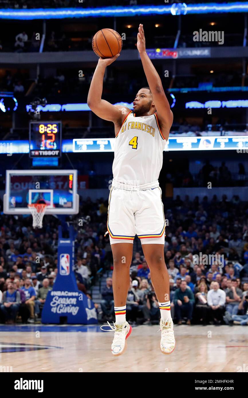 Golden State Warriors forward Omari Spellman (4) goes up for a shot ...