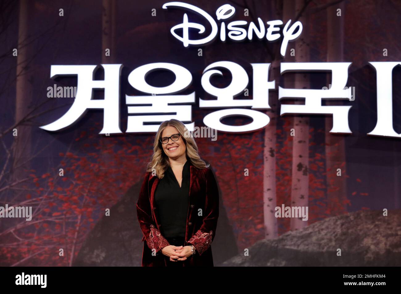 Director Jennifer Lee poses for the media before a press conference for ...