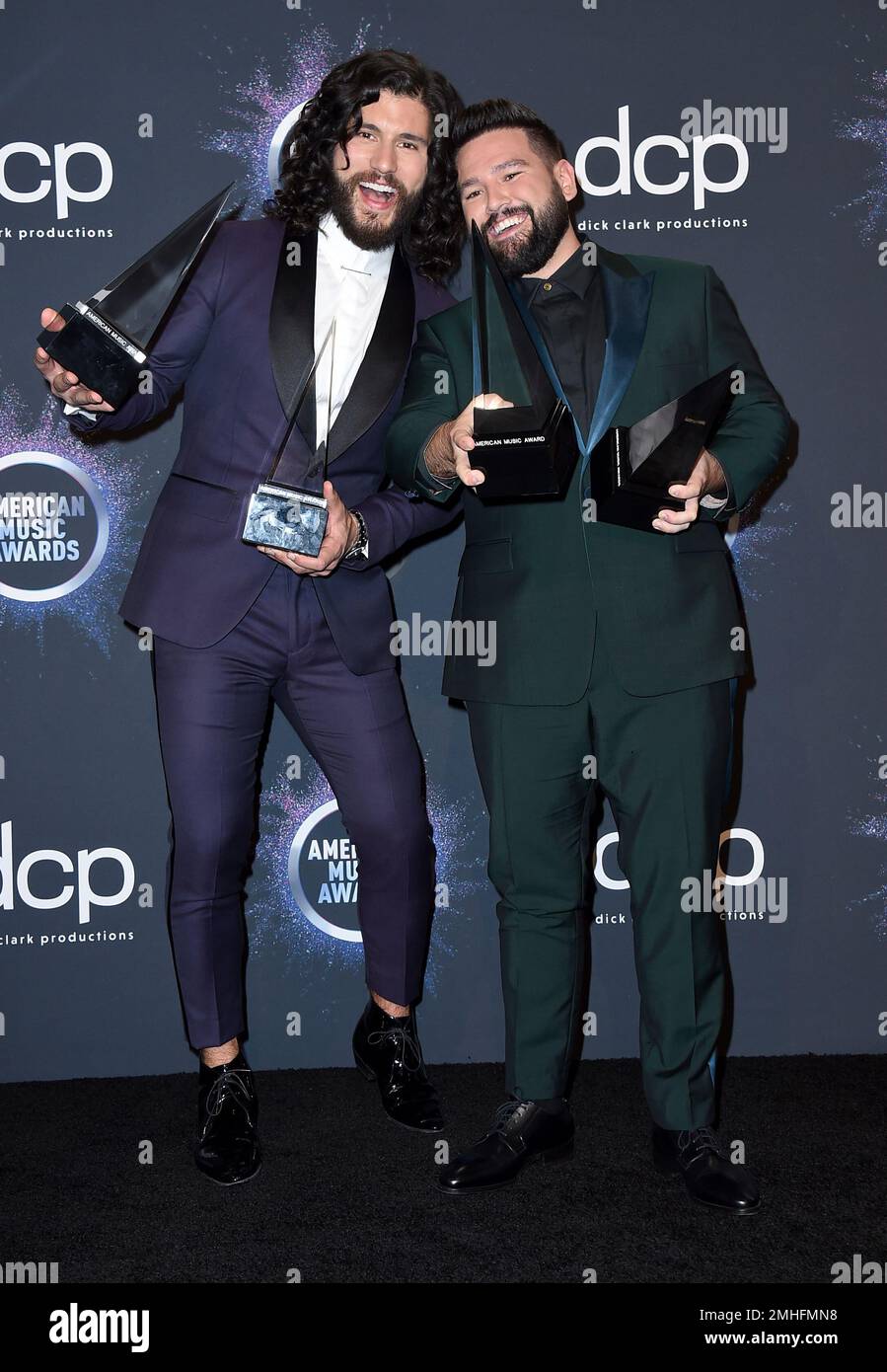 Dan Smyers, left, and Shay Mooney, of Dan + Shay, pose in the press ...