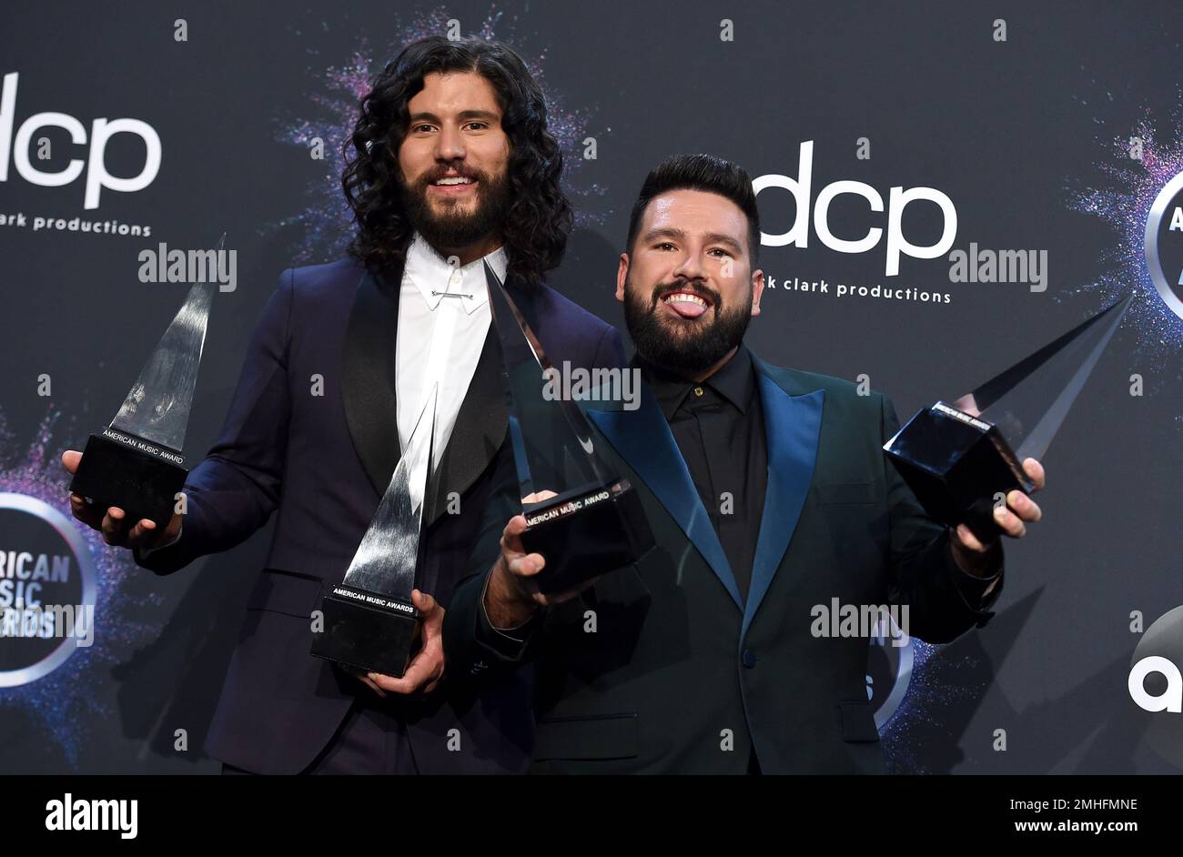 Dan Smyers, left, and Shay Mooney, of Dan + Shay, pose in the press ...