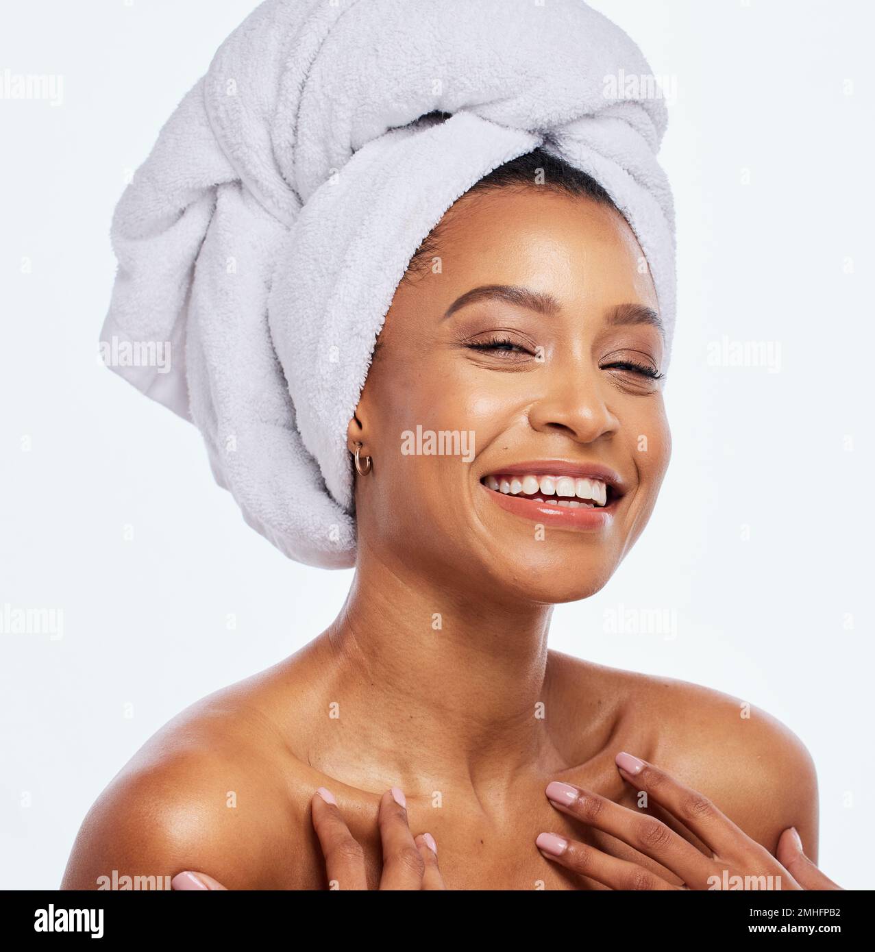 Hair care, towel and woman face portrait in studio, isolated white ...