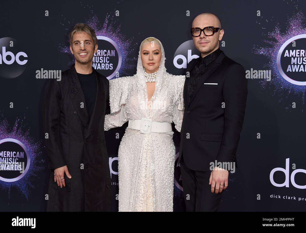 Chad King, from left, Christina Aguilera and Ian Axel arrive at the ...