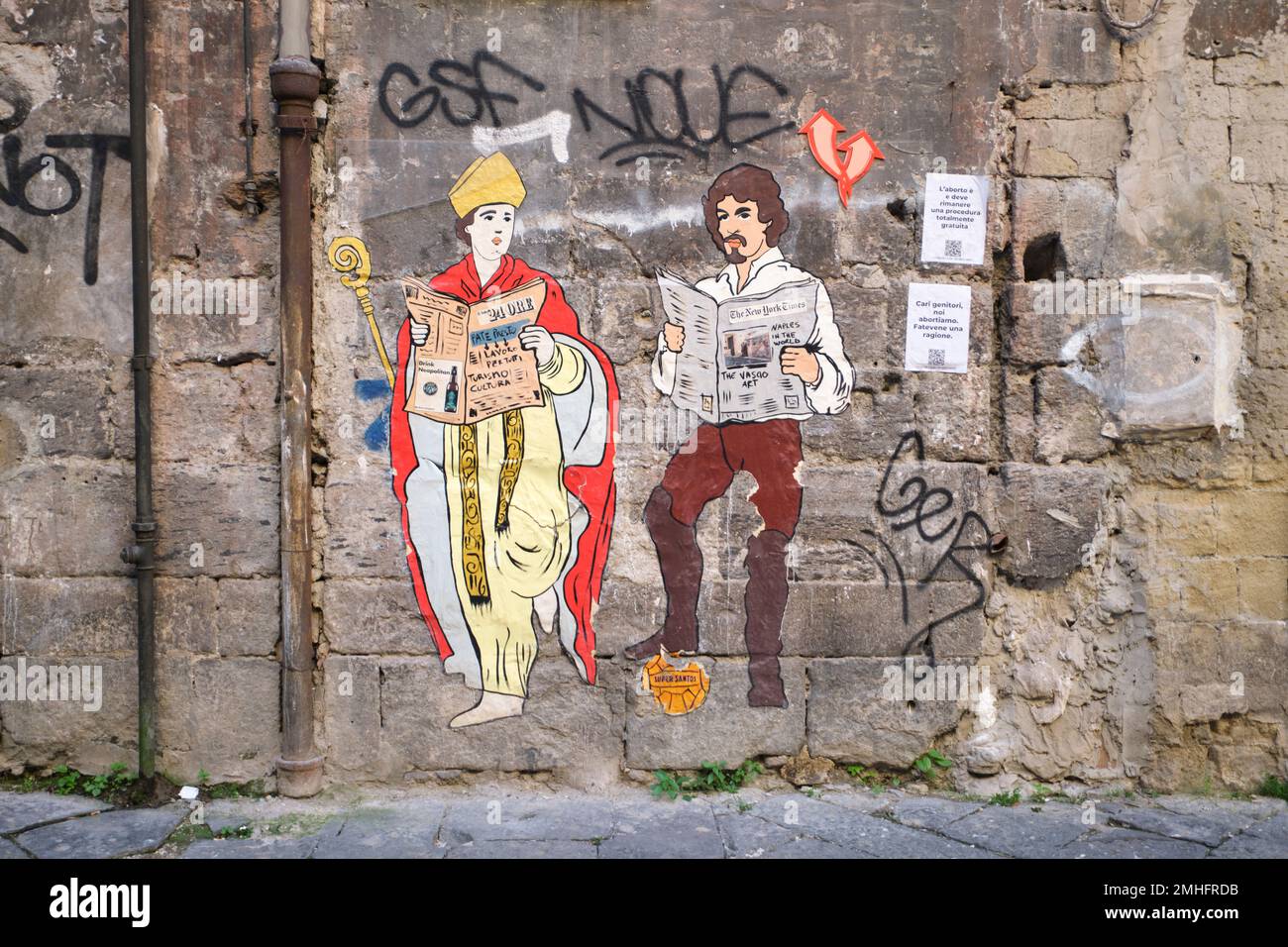 Two paper posters, depicting Saint Gennaro and artist Caravaggio, both ...