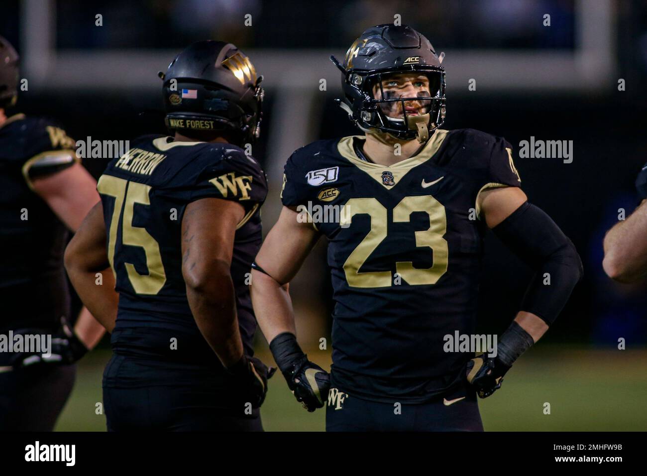 Wake Forest linebacker Justin Strnad (23) and offensive lineman Justin ...