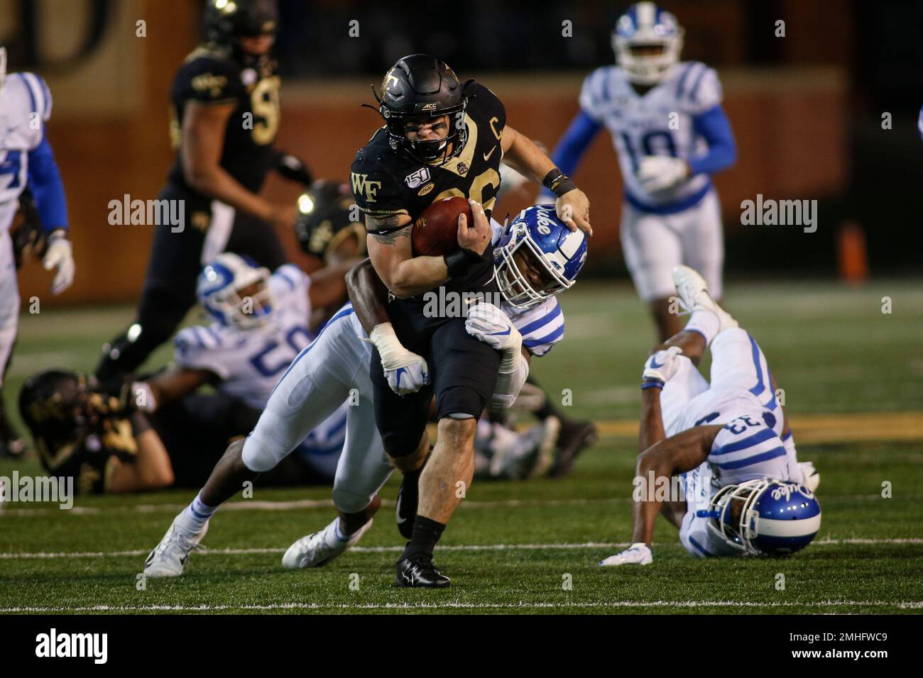 Wake Forest running back Cade Carney breaks through the Duke defense ...