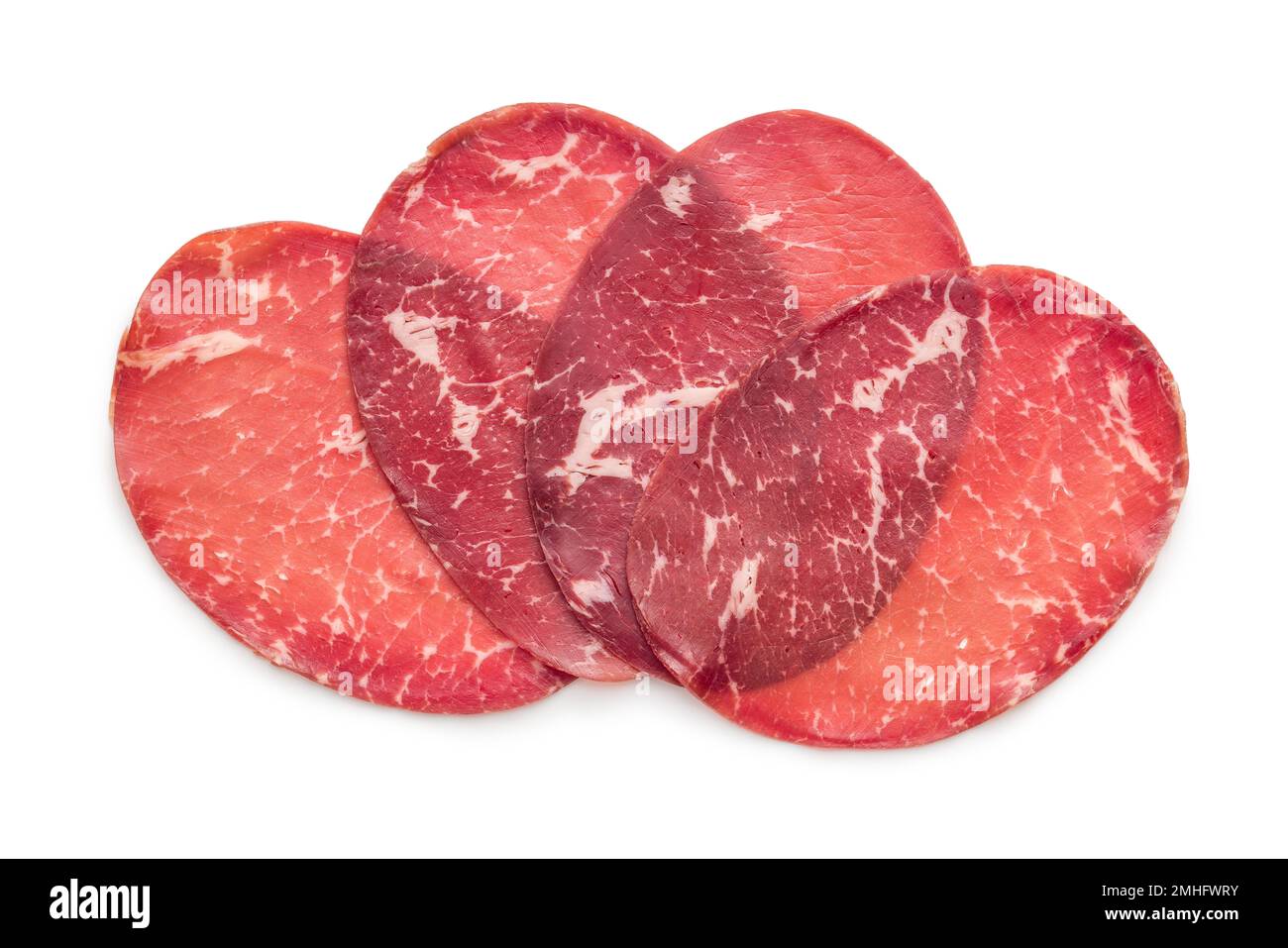 Smoked bresaola. Italian appetizer. Dried beef meat isolated on the ...