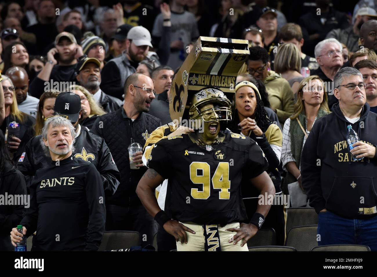 New Orleans Saints fans cheer the team, during the first half at an NFL ...