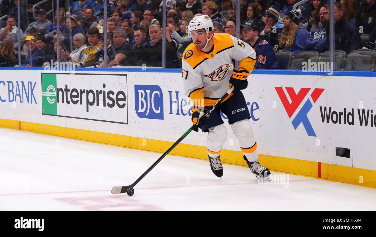Nashville Predators' Dante Fabbro (57) controls the puck during an NHL ...