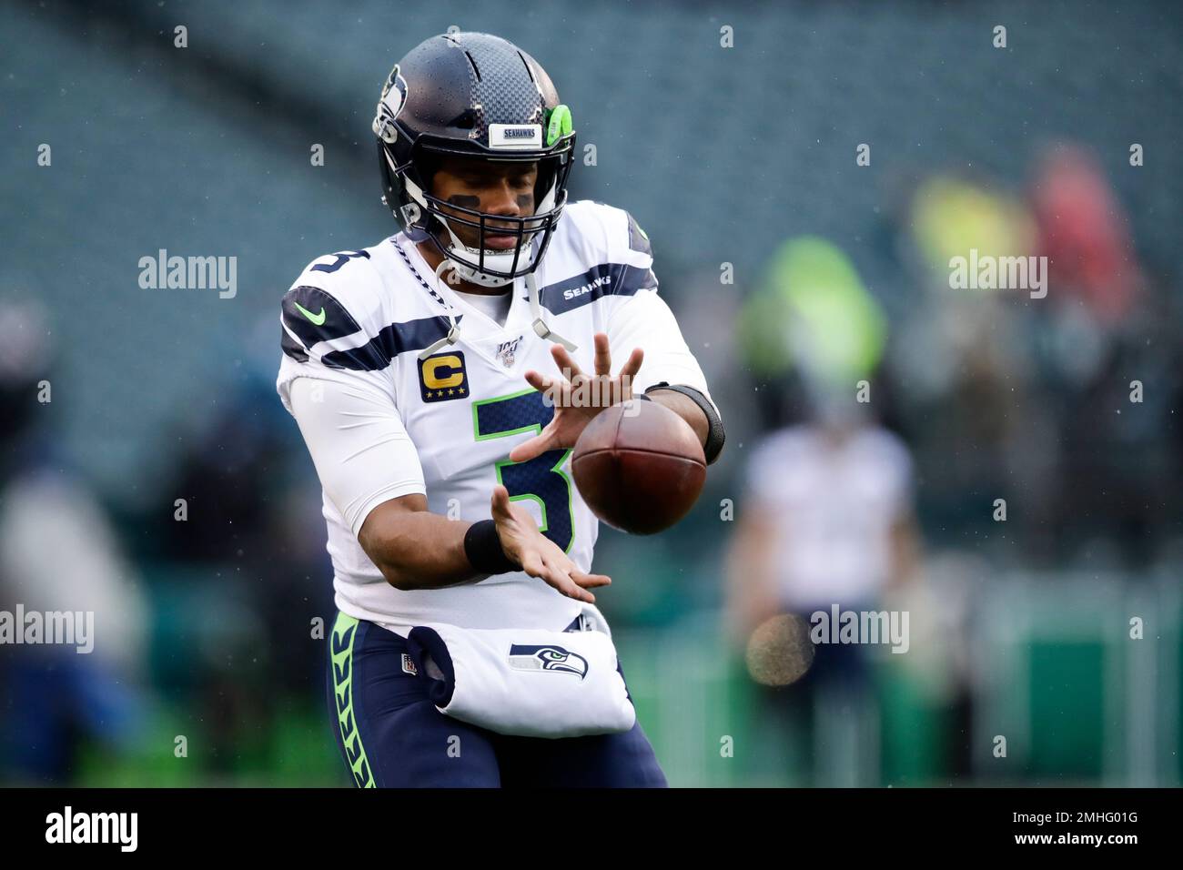 Seattle Seahawks' Russell Wilson warms up before an NFL football game ...